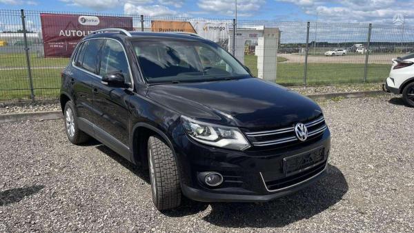 Black Volkswagen Tiguan 2014 in Marijampole, with an engine capacity of 1.97 L and mileage of 320 thousand km for 8990 €, photo 6 on AUTOMOTO.COM.LV
