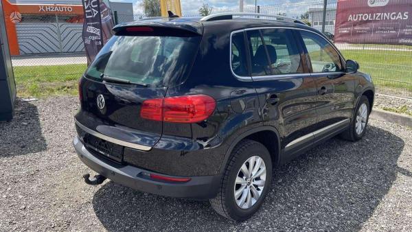 Black Volkswagen Tiguan 2014 in Marijampole, with an engine capacity of 1.97 L and mileage of 320 thousand km for 8990 €, photo 9 on AUTOMOTO.COM.LV