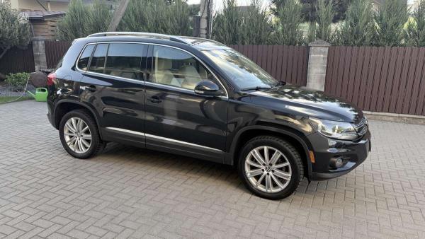 Black Volkswagen Tiguan 2014 in Kaunas, with an engine capacity of 1.98 L and mileage of 129 thousand km for 10400 €, photo 2 on AUTOMOTO.COM.LV