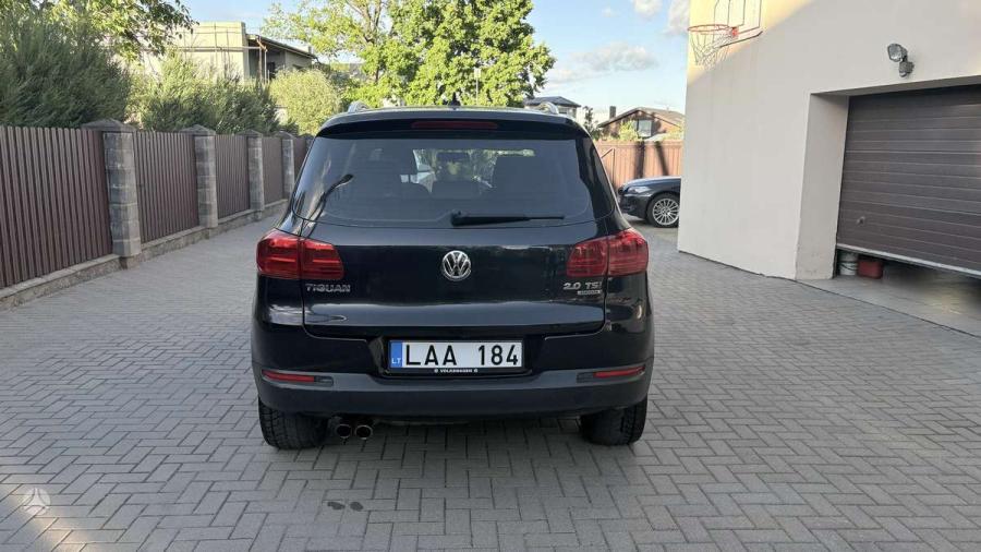 Black Volkswagen Tiguan 2014 in Kaunas, with an engine capacity of 1.98 L and mileage of 129 thousand km for 10400 €, photo 4 on AUTOMOTO.COM.LV
