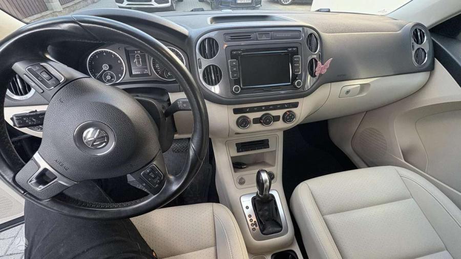 Black Volkswagen Tiguan 2014 in Kaunas, with an engine capacity of 1.98 L and mileage of 129 thousand km for 10400 €, photo 9 on AUTOMOTO.COM.LV