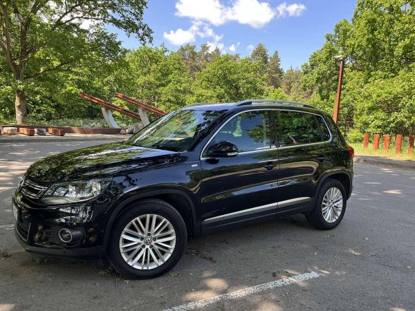 Melns Volkswagen Tiguan 2014 Jurbarkas, ar dzinēja tilpumu 2.00 L un nobraukumu 160 tūkst. km par 10400 €, foto 1 vietnē AUTOMOTO.COM.LV