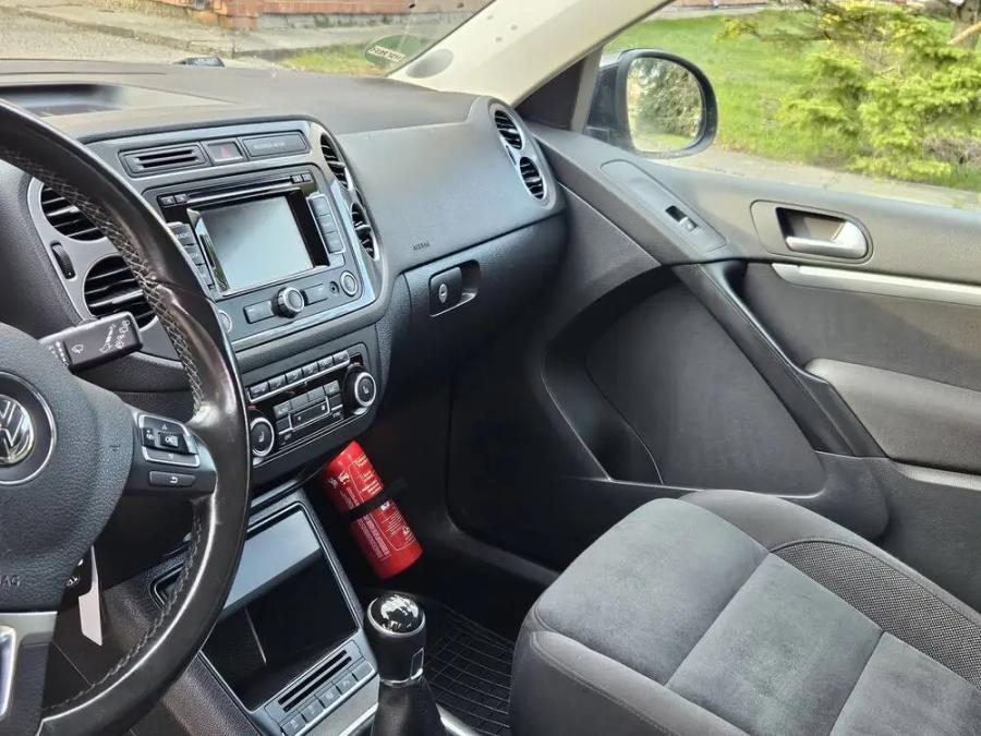 Melns Volkswagen Tiguan 2014 Jēkabpils, ar dzinēja tilpumu 2.00 L un nobraukumu 202 tūkst. km par 7150 €, foto 13 vietnē AUTOMOTO.COM.LV