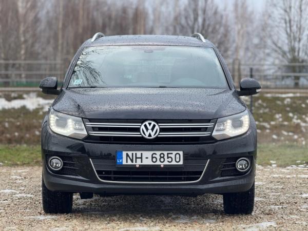 Melns Volkswagen Tiguan 2014 Rīga, ar dzinēja tilpumu 2.00 L un nobraukumu 243 tūkst. km par 11990 €, foto 1 vietnē AUTOMOTO.COM.LV