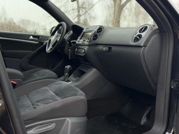 Melns Volkswagen Tiguan 2014 Rīga, ar dzinēja tilpumu 2.00 L un nobraukumu 243 tūkst. km par 11990 €, foto 7 vietnē AUTOMOTO.COM.LV