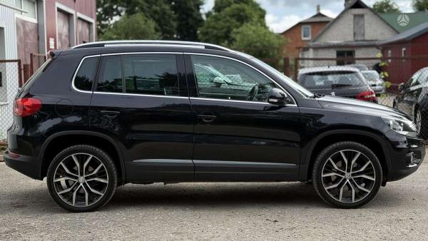 Black Volkswagen Tiguan 2014 in Ukmerge, with an engine capacity of 1.97 L and mileage of 300 thousand km for 7900 €, photo 7 on AUTOMOTO.COM.LV