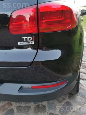 Melns Volkswagen Tiguan 2014 Liepāja, ar dzinēja tilpumu 2.00 L un nobraukumu 114 tūkst. km par 11400 €, foto 5 vietnē AUTOMOTO.COM.LV