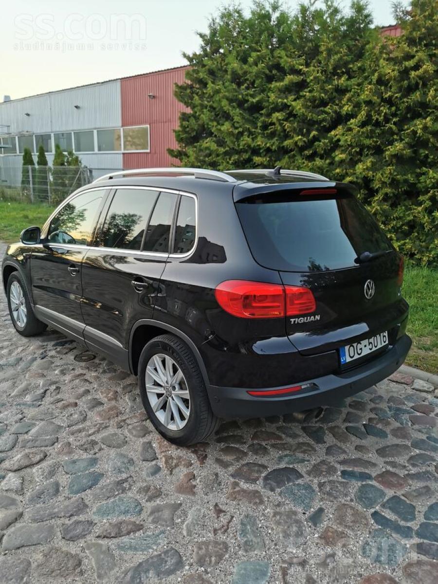 Melns Volkswagen Tiguan 2014 Liepāja, ar dzinēja tilpumu 2.00 L un nobraukumu 114 tūkst. km par 11400 €, foto 7 vietnē AUTOMOTO.COM.LV