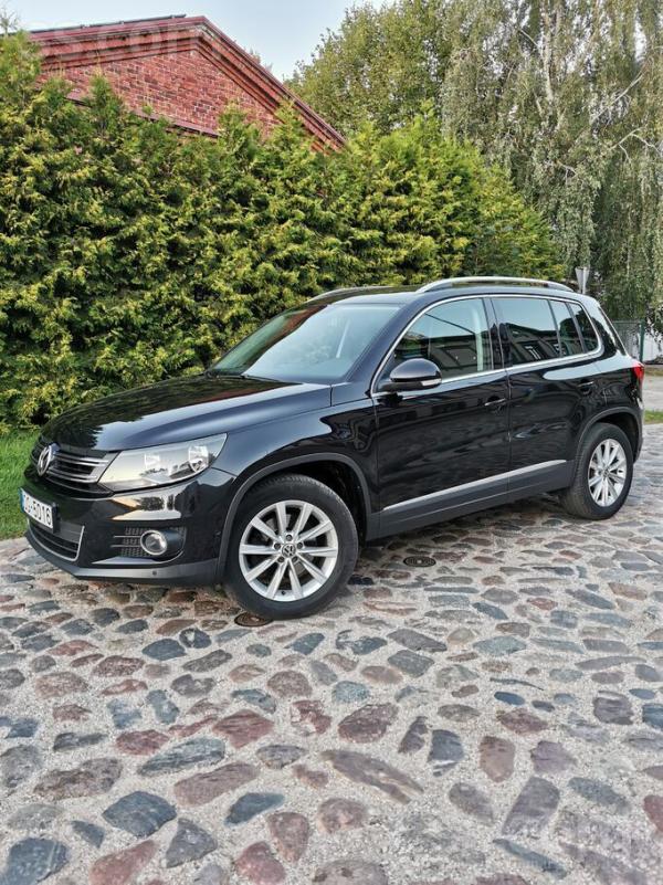 Melns Volkswagen Tiguan 2014 Liepāja, ar dzinēja tilpumu 2.00 L un nobraukumu 114 tūkst. km par 11400 €, foto 7 vietnē AUTOMOTO.COM.LV