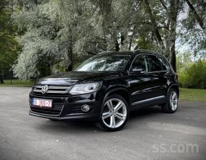 Black Volkswagen Tiguan 2014 in Jurmala, with an engine capacity of 2.00 L and mileage of 266 thousand km for 9950 €, photo  on AUTOMOTO.COM.LV