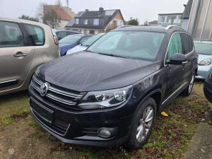 Black Volkswagen Tiguan 2015 in Radviliskis, with an engine capacity of 1.97 L and mileage of 210 thousand km for 9500 €, photo  on AUTOMOTO.COM.LV