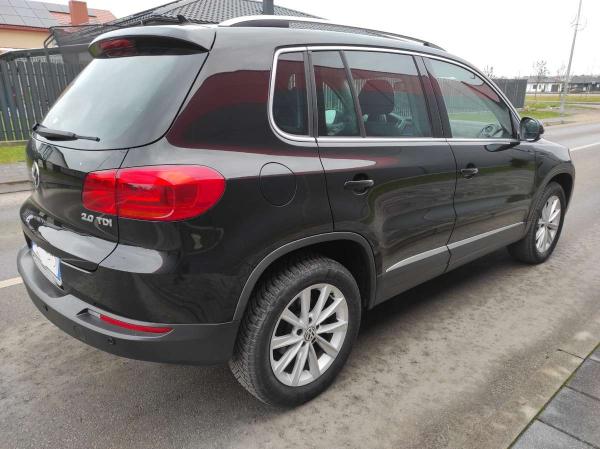 Black Volkswagen Tiguan 2015 in Panevezys, with an engine capacity of 1.97 L and mileage of 327 thousand km for 9000 €, photo 8 on AUTOMOTO.COM.LV
