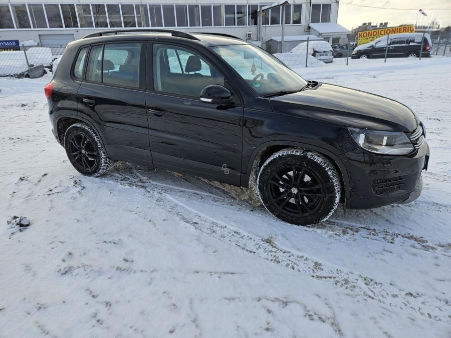 Black Volkswagen Tiguan 2015 in Panevezys, with an engine capacity of 2.00 L and mileage of 232 thousand km for 7500 €, photo 7 on AUTOMOTO.COM.LV