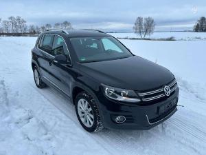 Black Volkswagen Tiguan 2015 in Kaunas, with an engine capacity of 1.97 L and mileage of 260 thousand km for 9999 €, photo  on AUTOMOTO.COM.LV