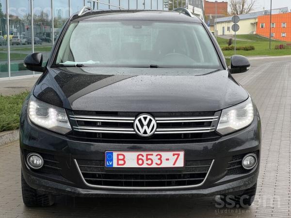 Black Volkswagen Tiguan 2015 in Rezekne, with an engine capacity of 2.00 L and mileage of 254 thousand km for 8800 €, photo 1 on AUTOMOTO.COM.LV