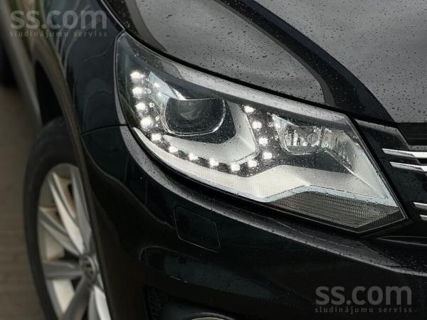 Black Volkswagen Tiguan 2015 in Rezekne, with an engine capacity of 2.00 L and mileage of 254 thousand km for 8800 €, photo 5 on AUTOMOTO.COM.LV