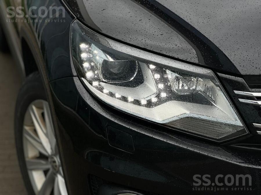 Black Volkswagen Tiguan 2015 in Rezekne, with an engine capacity of 2.00 L and mileage of 254 thousand km for 8800 €, photo 5 on AUTOMOTO.COM.LV