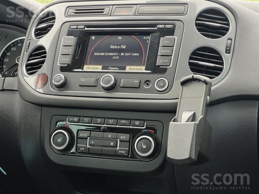 Black Volkswagen Tiguan 2015 in Rezekne, with an engine capacity of 2.00 L and mileage of 254 thousand km for 8800 €, photo 15 on AUTOMOTO.COM.LV