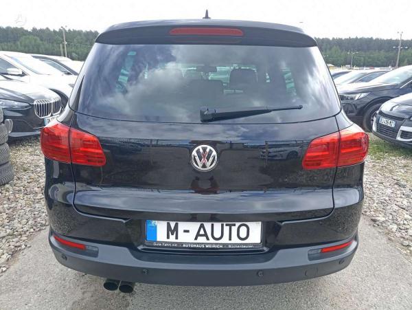 Black Volkswagen Tiguan 2015 in Vilnius, with an engine capacity of 1.39 L and mileage of 126 thousand km for 9970 €, photo 5 on AUTOMOTO.COM.LV