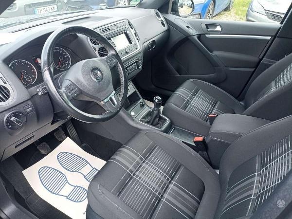 Black Volkswagen Tiguan 2015 in Vilnius, with an engine capacity of 1.39 L and mileage of 126 thousand km for 9970 €, photo 9 on AUTOMOTO.COM.LV
