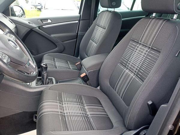 Black Volkswagen Tiguan 2015 in Vilnius, with an engine capacity of 1.39 L and mileage of 126 thousand km for 9970 €, photo 10 on AUTOMOTO.COM.LV