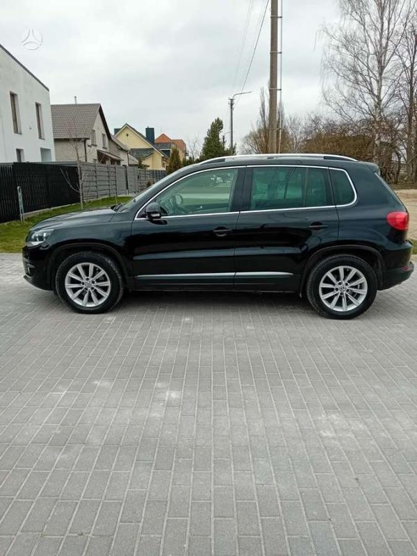 Black Volkswagen Tiguan 2015 in Siauliai, with an engine capacity of 1.97 L and mileage of 247 thousand km for 9150 €, photo 1 on AUTOMOTO.COM.LV