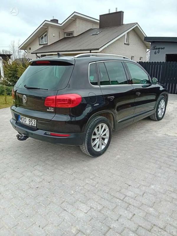 Black Volkswagen Tiguan 2015 in Siauliai, with an engine capacity of 1.97 L and mileage of 247 thousand km for 9150 €, photo 5 on AUTOMOTO.COM.LV