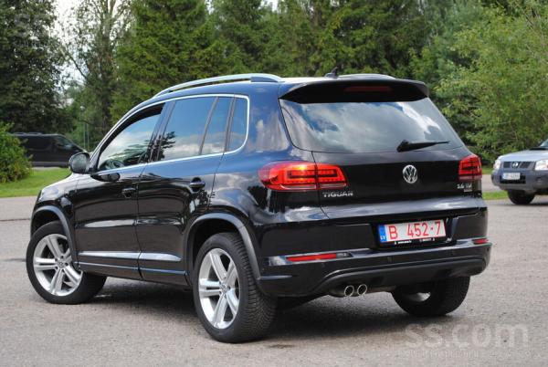 Black Volkswagen Tiguan 2015 in Riga, with an engine capacity of 2.00 L and mileage of 249 thousand km for 12490 €, photo 3 on AUTOMOTO.COM.LV