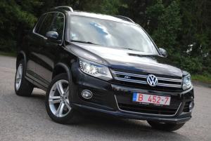 Black Volkswagen Tiguan 2015 in Riga, with an engine capacity of 2.00 L and mileage of 249 thousand km for 12490 €, photo 5 on AUTOMOTO.COM.LV