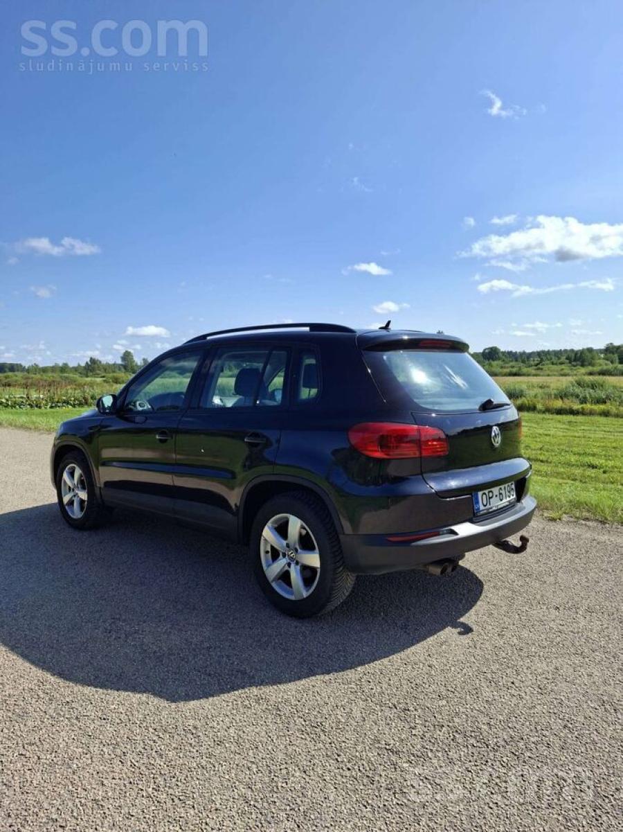 Black Volkswagen Tiguan 2015 in Aizkraukle, with an engine capacity of 1.40 L and mileage of 148 thousand km for 9800 €, photo 5 on AUTOMOTO.COM.LV