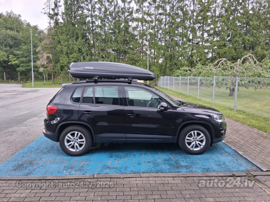 Black Volkswagen Tiguan 2015 in Tallinn, with an engine capacity of 1.40 L and mileage of 112 thousand km for 8290 €, photo 3 on AUTOMOTO.COM.LV