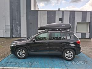 Black Volkswagen Tiguan 2015 in Tallinn, with an engine capacity of 1.40 L and mileage of 112 thousand km for 8290 €, photo 4 on AUTOMOTO.COM.LV