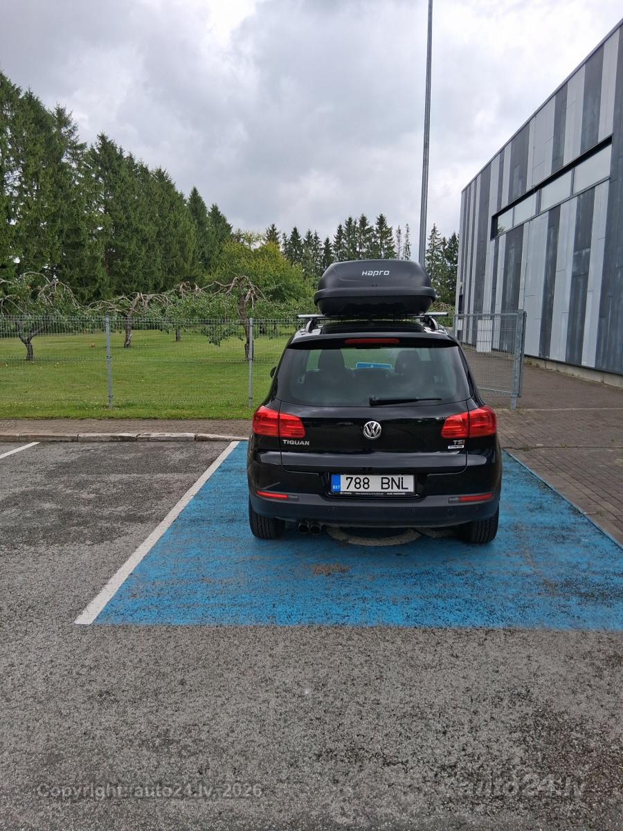 Black Volkswagen Tiguan 2015 in Tallinn, with an engine capacity of 1.40 L and mileage of 112 thousand km for 8290 €, photo 5 on AUTOMOTO.COM.LV