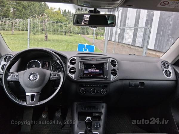 Black Volkswagen Tiguan 2015 in Tallinn, with an engine capacity of 1.40 L and mileage of 112 thousand km for 8290 €, photo 5 on AUTOMOTO.COM.LV
