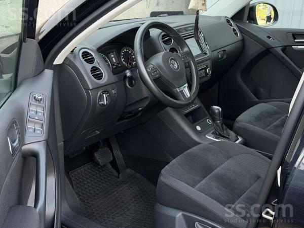 Black Volkswagen Tiguan 2015 in Riga, with an engine capacity of 2.00 L and mileage of 51 thousand km for 12280 €, photo 8 on AUTOMOTO.COM.LV