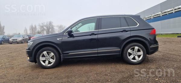 Black Volkswagen Tiguan 2016 in Daugavpils, with an engine capacity of 2.00 L and mileage of 254 thousand km for 16450 €, photo 2 on AUTOMOTO.COM.LV