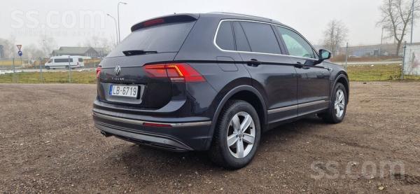 Black Volkswagen Tiguan 2016 in Daugavpils, with an engine capacity of 2.00 L and mileage of 254 thousand km for 16450 €, photo 5 on AUTOMOTO.COM.LV