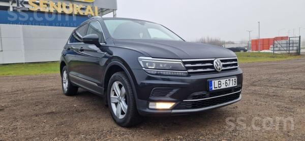 Black Volkswagen Tiguan 2016 in Daugavpils, with an engine capacity of 2.00 L and mileage of 254 thousand km for 16450 €, photo 7 on AUTOMOTO.COM.LV