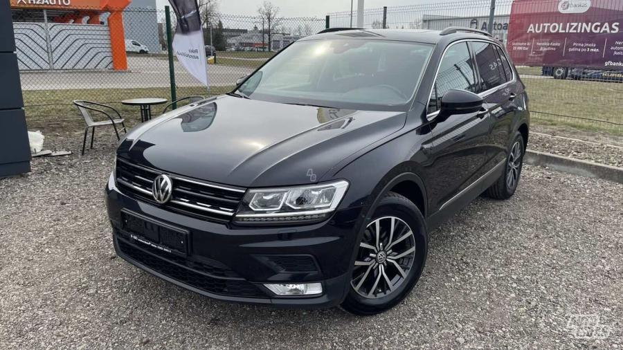 Black Volkswagen Tiguan 2016 in Marijampole, with an engine capacity of 2.00 L and mileage of 200 thousand km for 15650 €, photo 1 on AUTOMOTO.COM.LV