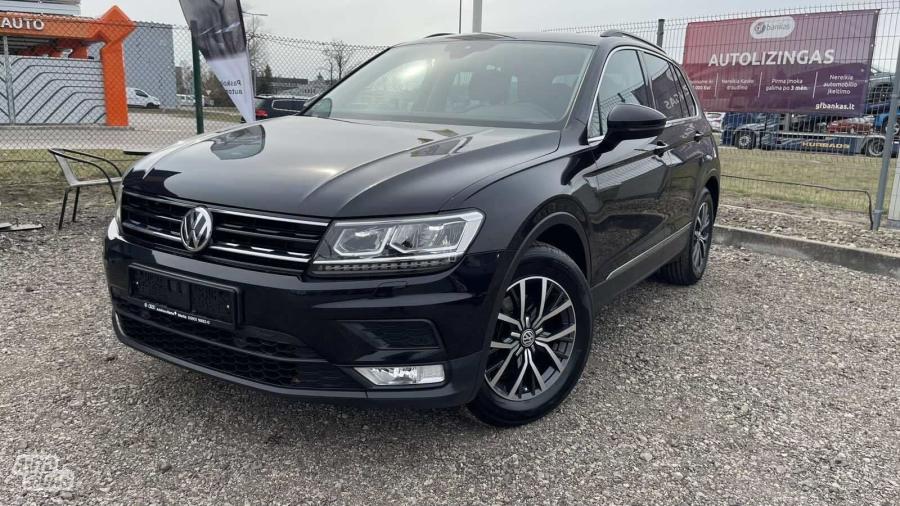 Black Volkswagen Tiguan 2016 in Marijampole, with an engine capacity of 2.00 L and mileage of 200 thousand km for 15650 €, photo 2 on AUTOMOTO.COM.LV