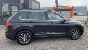 Black Volkswagen Tiguan 2016 in Marijampole, with an engine capacity of 2.00 L and mileage of 200 thousand km for 15650 €, photo 6 on AUTOMOTO.COM.LV