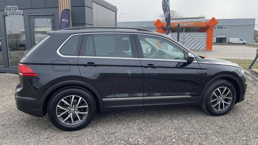 Black Volkswagen Tiguan 2016 in Marijampole, with an engine capacity of 2.00 L and mileage of 200 thousand km for 15650 €, photo 6 on AUTOMOTO.COM.LV