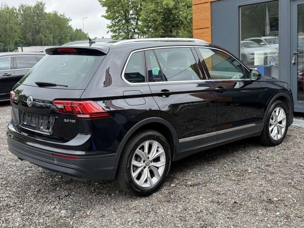 Black Volkswagen Tiguan 2016 in Kaunas, with an engine capacity of 2.00 L and mileage of 236 thousand km for 13950 €, photo 10 on AUTOMOTO.COM.LV