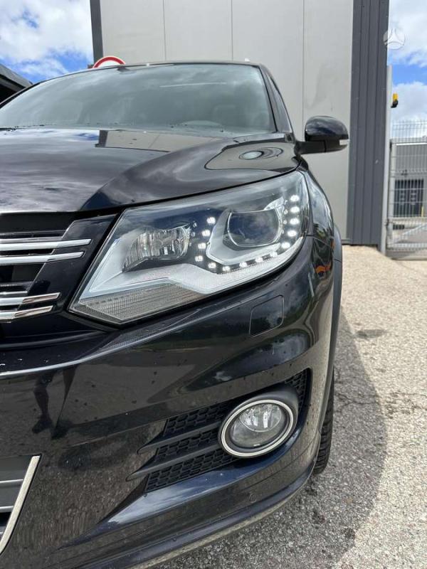 Black Volkswagen Tiguan 2016 in Marijampole, with an engine capacity of 1.39 L and mileage of 248 thousand km for 9550 €, photo 2 on AUTOMOTO.COM.LV