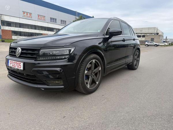 Black Volkswagen Tiguan 2016 in Panevezys, with an engine capacity of 1.97 L and mileage of 274 thousand km for 15999 €, photo 5 on AUTOMOTO.COM.LV