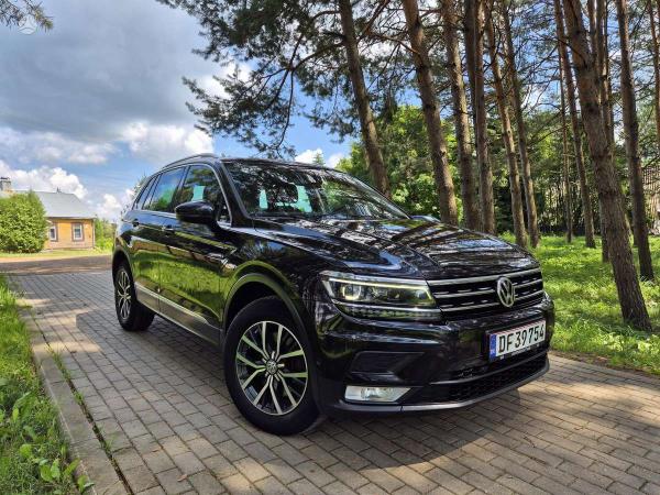 Black Volkswagen Tiguan 2016 in Utena, with an engine capacity of 1.97 L and mileage of 284 thousand km for 14990 €, photo 2 on AUTOMOTO.COM.LV