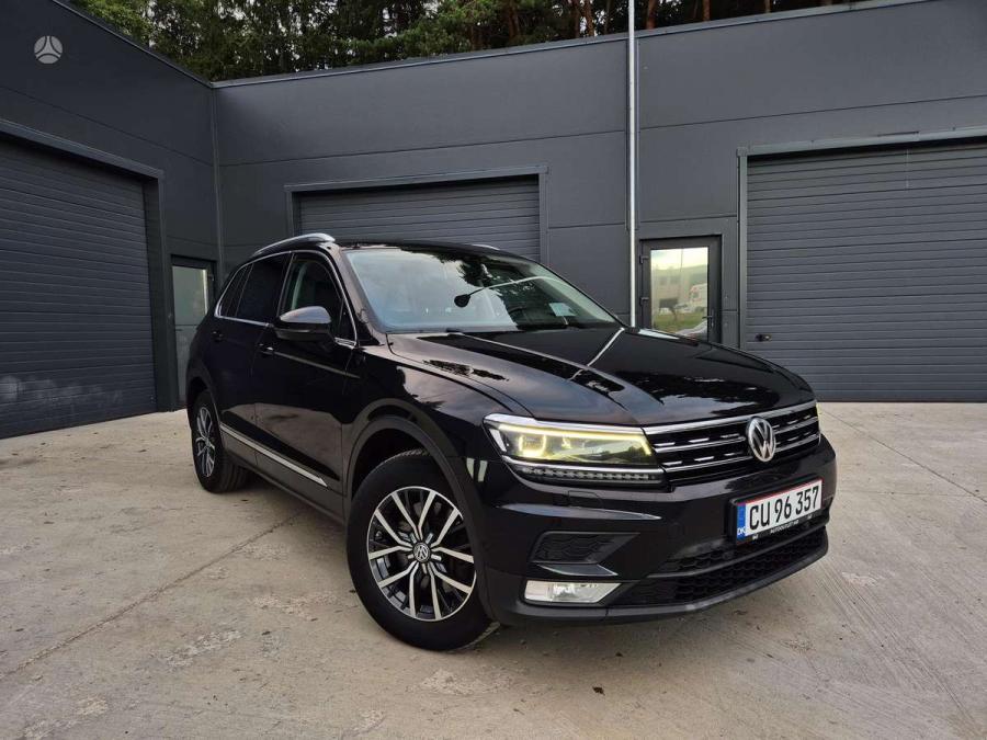 Black Volkswagen Tiguan 2016 in Utena, with an engine capacity of 1.97 L and mileage of 284 thousand km for 12990 €, photo 3 on AUTOMOTO.COM.LV