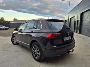Black Volkswagen Tiguan 2016 in Utena, with an engine capacity of 1.97 L and mileage of 284 thousand km for 12990 €, photo 4 on AUTOMOTO.COM.LV