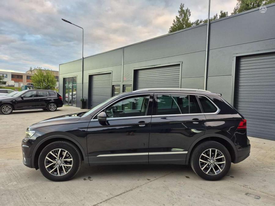 Black Volkswagen Tiguan 2016 in Utena, with an engine capacity of 1.97 L and mileage of 284 thousand km for 12990 €, photo 6 on AUTOMOTO.COM.LV