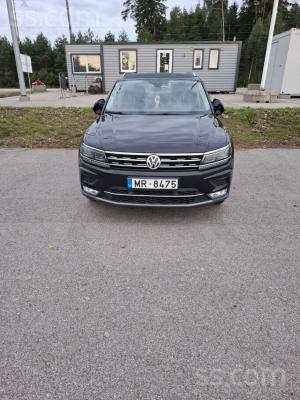 Black Volkswagen Tiguan 2016 in Jelgava, with an engine capacity of 2.00 L and mileage of 242 thousand km for 15400 €, photo  on AUTOMOTO.COM.LV